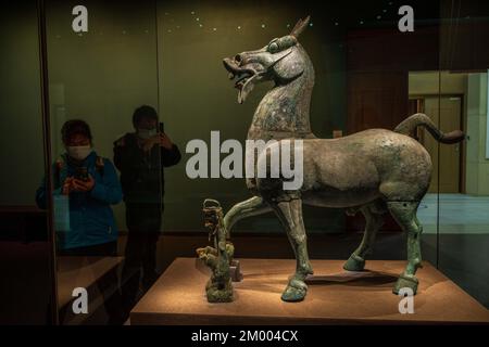 NANNING, CHINA - DECEMBER 1, 2022 - People look at the pottery pottery ...