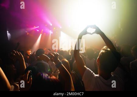 Back row concert show with people clapping the live stage Stock Photo ...