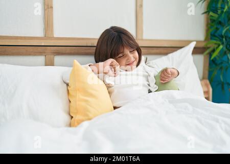 Adorable girl smiling confident stretching at sport center Stock Photo ...