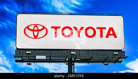 Advertisement billboard displaying logo of Toyota Stock Photo - Alamy