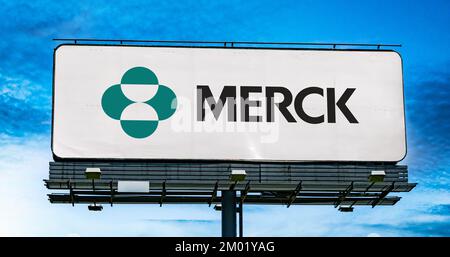 Advertisement billboard displaying logo of Merck Stock Photo - Alamy