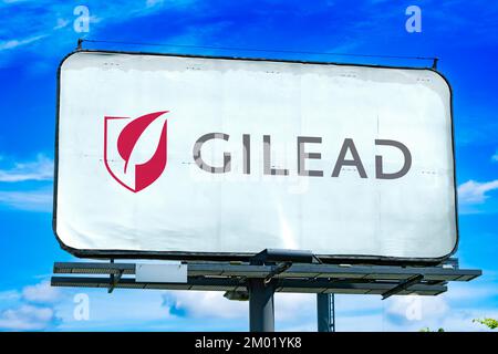 Advertisement billboard displaying logo of Gilead Sciences Stock Photo ...