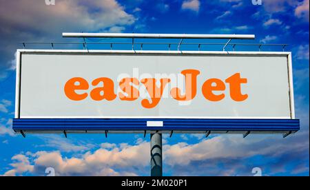 Advertisement billboard displaying logo of EasyJet Stock Photo - Alamy