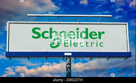 Advertisement billboard displaying logo of Schneider Electric Stock ...