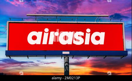 Advertisement billboard displaying logo of AirAsia Stock Photo - Alamy