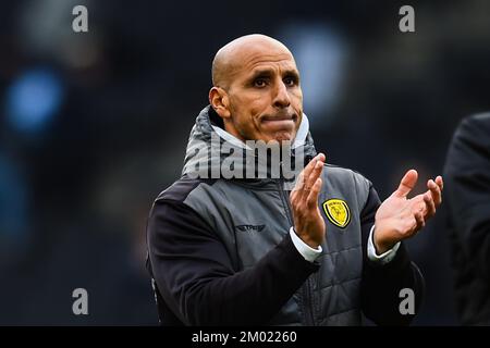 Dino Maamria Manager of Burton Albion applauds the home fans after the ...