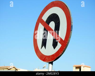 No U-turn sign, a regulatory sign posted at intersections to indicate ...