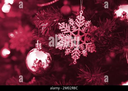 Christmas purpur or viva magenta color ball on monochrome background ...