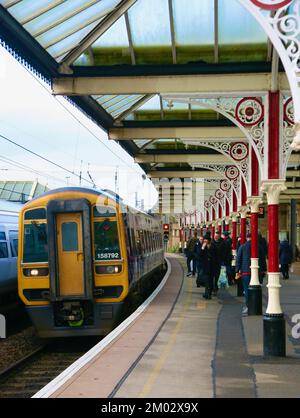 A view of the passengers boarding their train at Skipton Railway ...