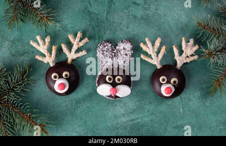 Reindeers made of cookies, chocolate, marshmallows and coconut flakes ...