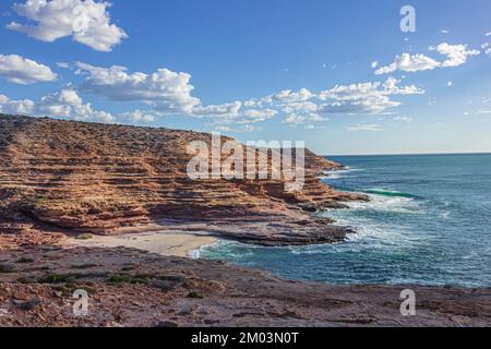 The view of Pot Alley where rugged rock cliff meets the Indian Ocean at ...