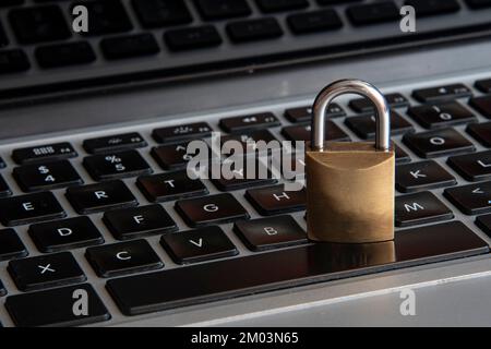 Internet and computer security represented by a closed padlock over a keyboard Stock Photo - Alamy