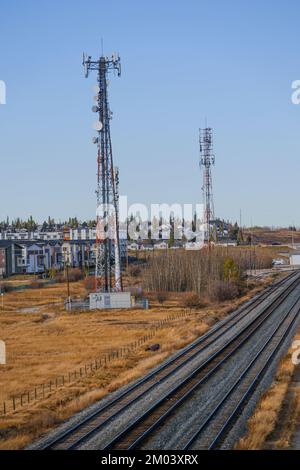 RF Communication transmission towers under cloudy sky Stock Photo - Alamy