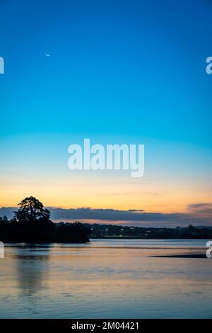 Sunset over Orewa Estuary, Auckland, North Island, New Zealand Stock ...