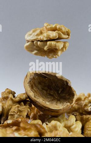 Delicious fresh peeled raw walnuts in a ceramic plate Stock Photo - Alamy
