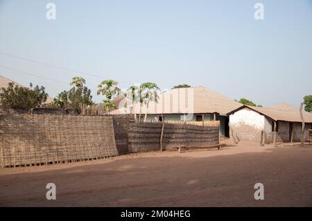 Rural area, Priame, Bafata Region, Guinea Bissau - neat fencing; well ...
