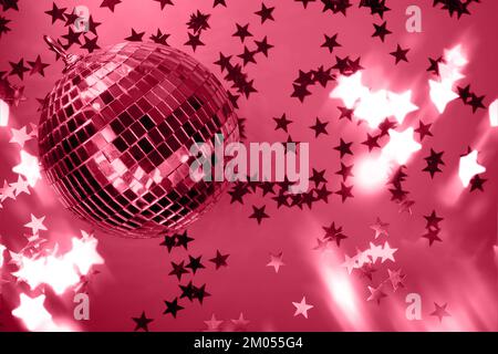 Christmas viva magenta ball with neon light. Creative Xmas party ...