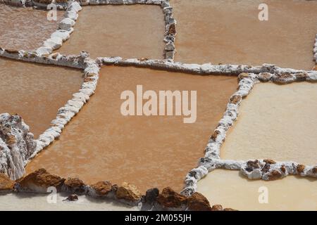 Traditional salt mines in Urubamba Peru Stock Photo - Alamy