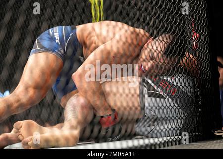 ORLANDO, FL - December 3: Natan Levy (L) and Genaro Valdez R) step in ...