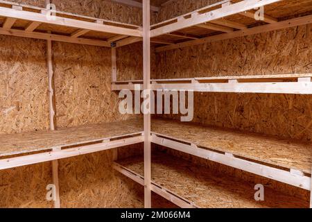 OSB racks, shelves are designed for storing things. Dressing room in ...