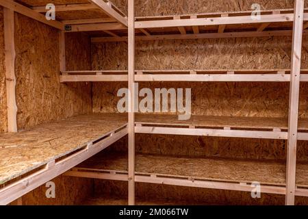 OSB racks, shelves are designed for storing things. Dressing room in ...