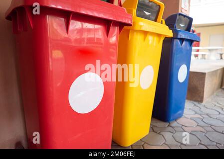 Color-segregated bins for proper waste separation Stock Photo - Alamy