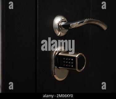 Door to the apartment with a combination lock. Keyless entry Stock ...