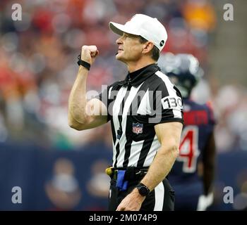 Referee Land Clark (130) signals intentional grounding during an NFL ...