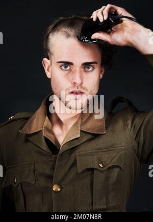 Military, soldier and man shaving hair in studio isolated on black ...