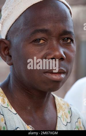 Faces of Africa, African man, Bafata, Guinea Bissau; Broad smile Stock ...