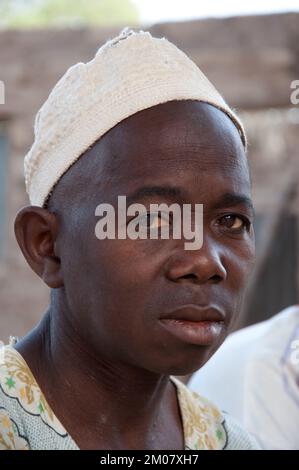 Faces of Africa, African man, Bafata, Guinea Bissau; Broad smile Stock ...