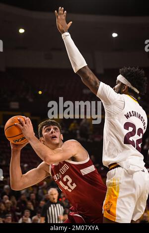 Stanford forward Maxime Raynaud (42) talks to teammates in the locker ...