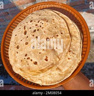 Chapati, also known as roti, rotli, safati, shabaati, phulka, chapo ...
