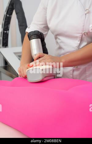 Crop masseuse doing vacuum massage to female customer Stock Photo - Alamy