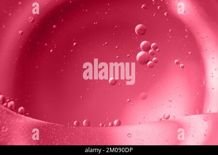 abstract light viva magenta background with oil circles . bubbles of ...