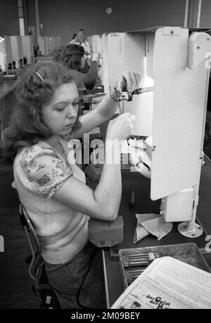 The production of electronic devices by female workers at the Siemens ...
