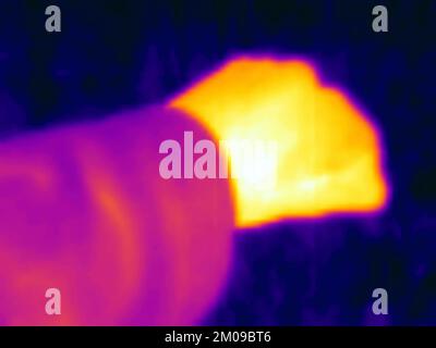 Hand gestures captured on thermal imager device. Warm hands of an ...