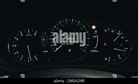 Car dashboard with sensors and information. RPM, Fuel indicator and ...