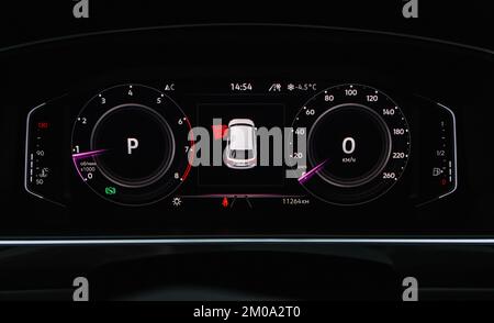 Color detail of an error message on a car dashboard. Door opened alarm ...