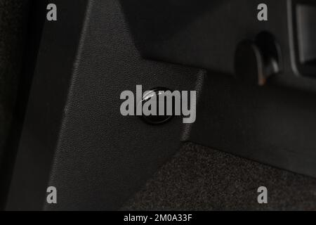 Modern car outlet socket. Closed 12V power outlet socket and 220v power ...