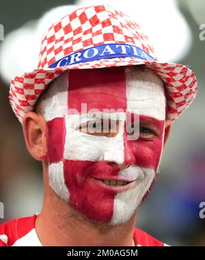A fan of Japan waits for the start of the World Cup Group F soccer ...