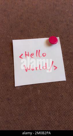 Red Text Hello World on sticky notes Stock Photo - Alamy
