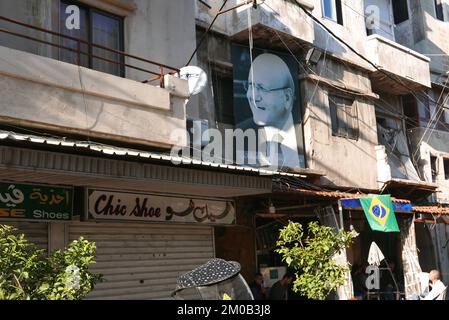 Prime Minister of Lebanon Najib Mikati and his wife May Mikati sign a ...