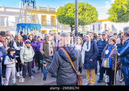 Huelva, Spain - December 4, 2022: A group of tourist starting a guided ...