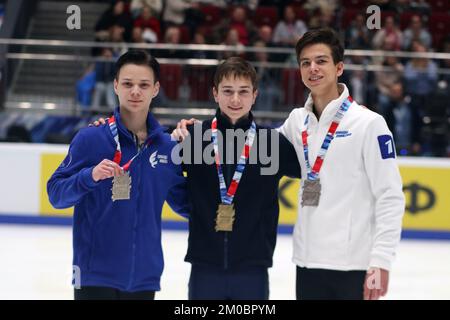 Grigory Fedorov (C), Gleb Lutfullin (L), Petr Gumennik (R) from figure ...