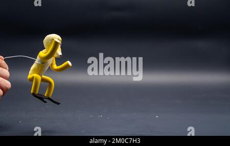 Stopmotion process of jumping. Jumping. Man's hand holding with an ...