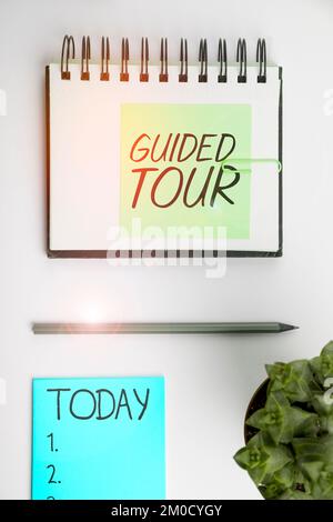 Writing displaying text Guided Tour. Business concept advice or ...