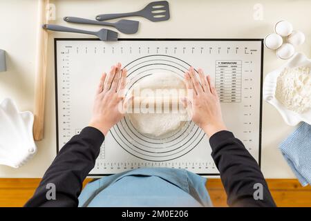 top view eggs, dough, flour and rolling-pin on wooden table Stock Photo ...