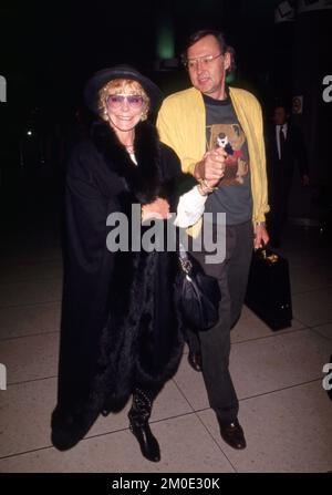 Elke Sommer and Wolf Walther seen at Los Angeles International Airport ...