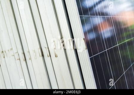 Second hand used solar panels stacked together, closeup Stock Photo - Alamy